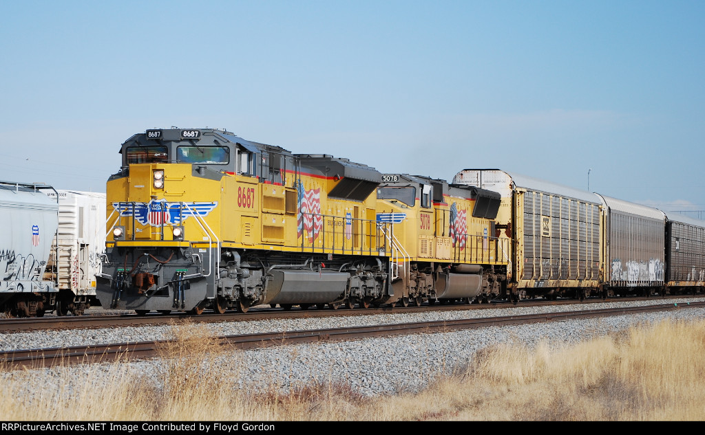 UP 8687 leads east bound UP autorack/double stack